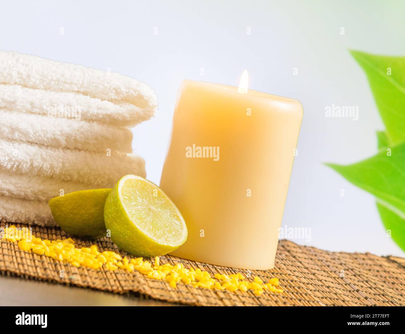 Spa massage border background with towel stacked and lime with leaves ...