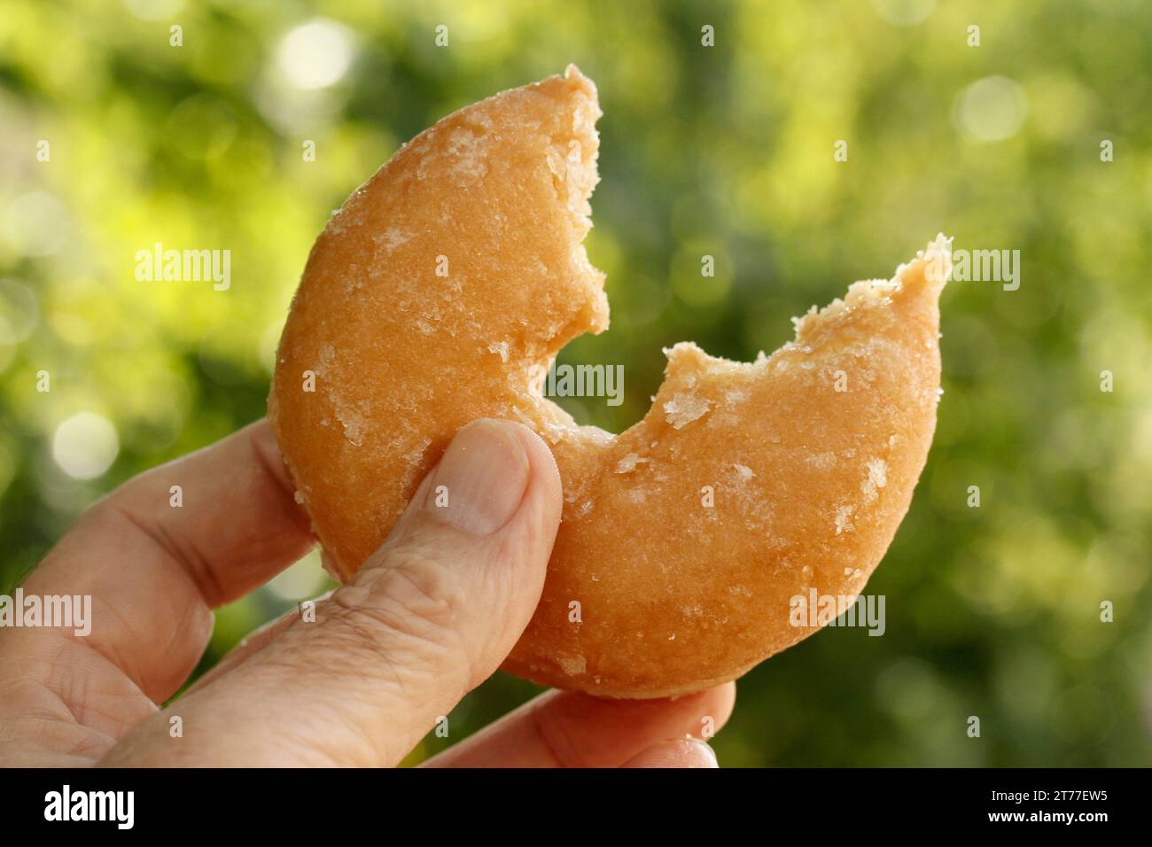 Bitten donut hi-res stock photography and images - Alamy