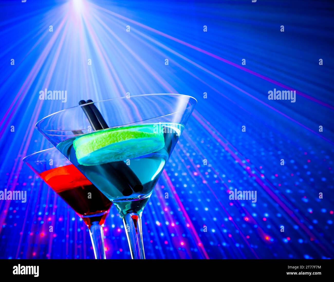 cocktail with blue light disco background with space for text, dance ...