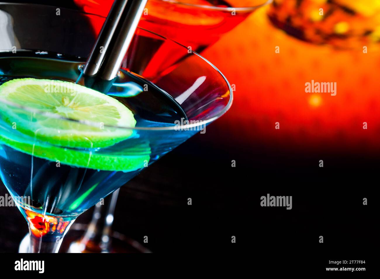 top of view of cocktail on sparkling disco ball background with space ...