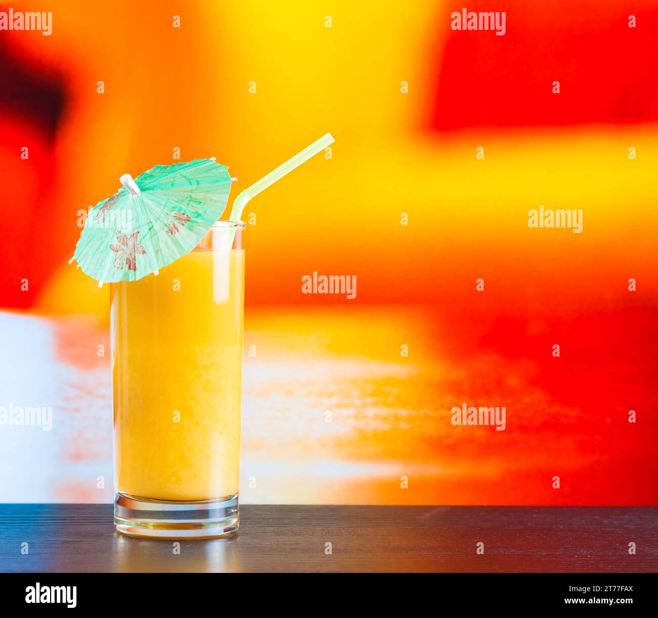 glass of orange juice on wood table and blur background Stock Photo - Alamy