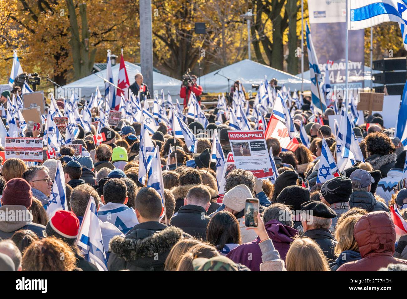 Thousands of protesters with flags take part during The UJA (United ...