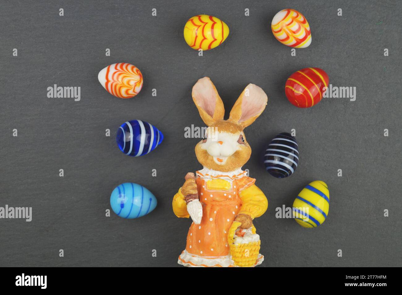 Easter bunny with Easter basket and Easter eggs Stock Photo - Alamy