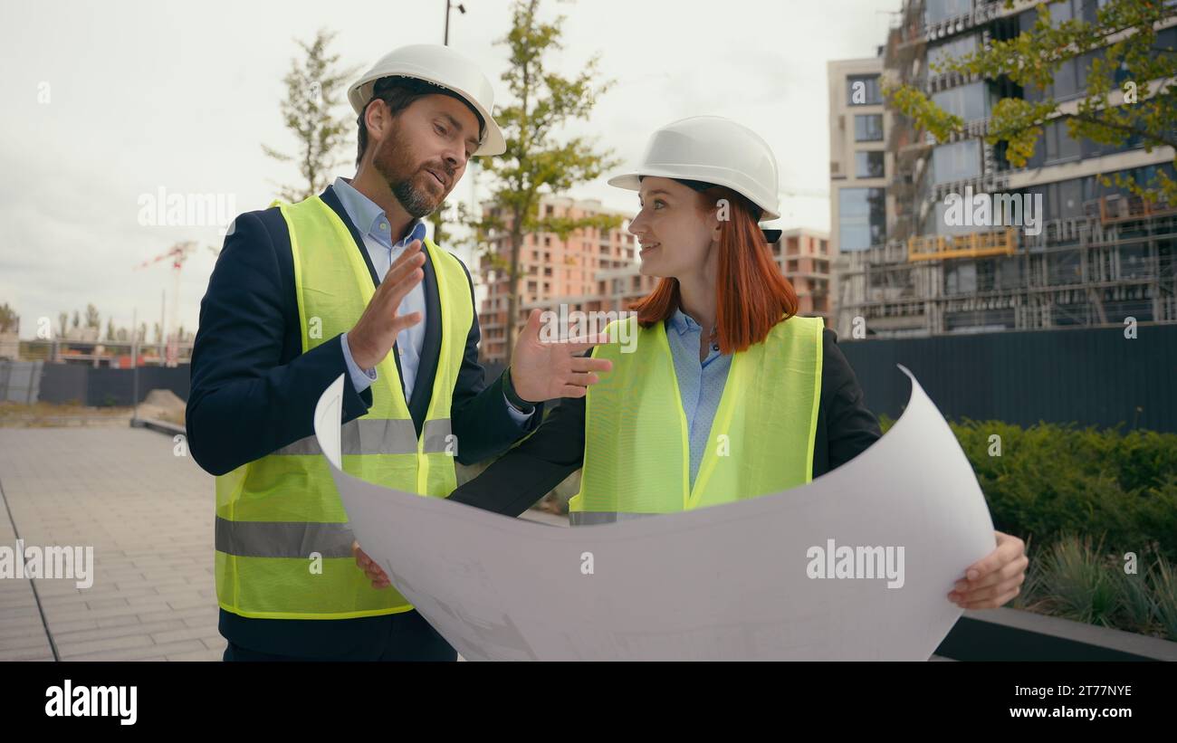 Teamwork two caucasian technicians inspect hi-res stock photography and ...