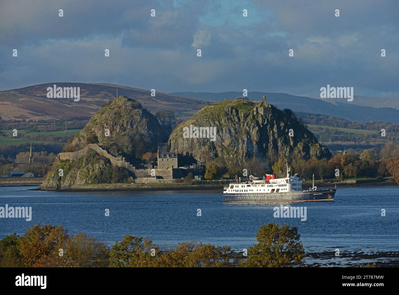 HEBRIDEAN PRINCESS cruising up-river passing DUMBARTON CASTLE on the ...