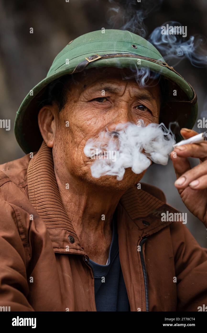 Vietnamese Man is relaxing after work Stock Photo - Alamy
