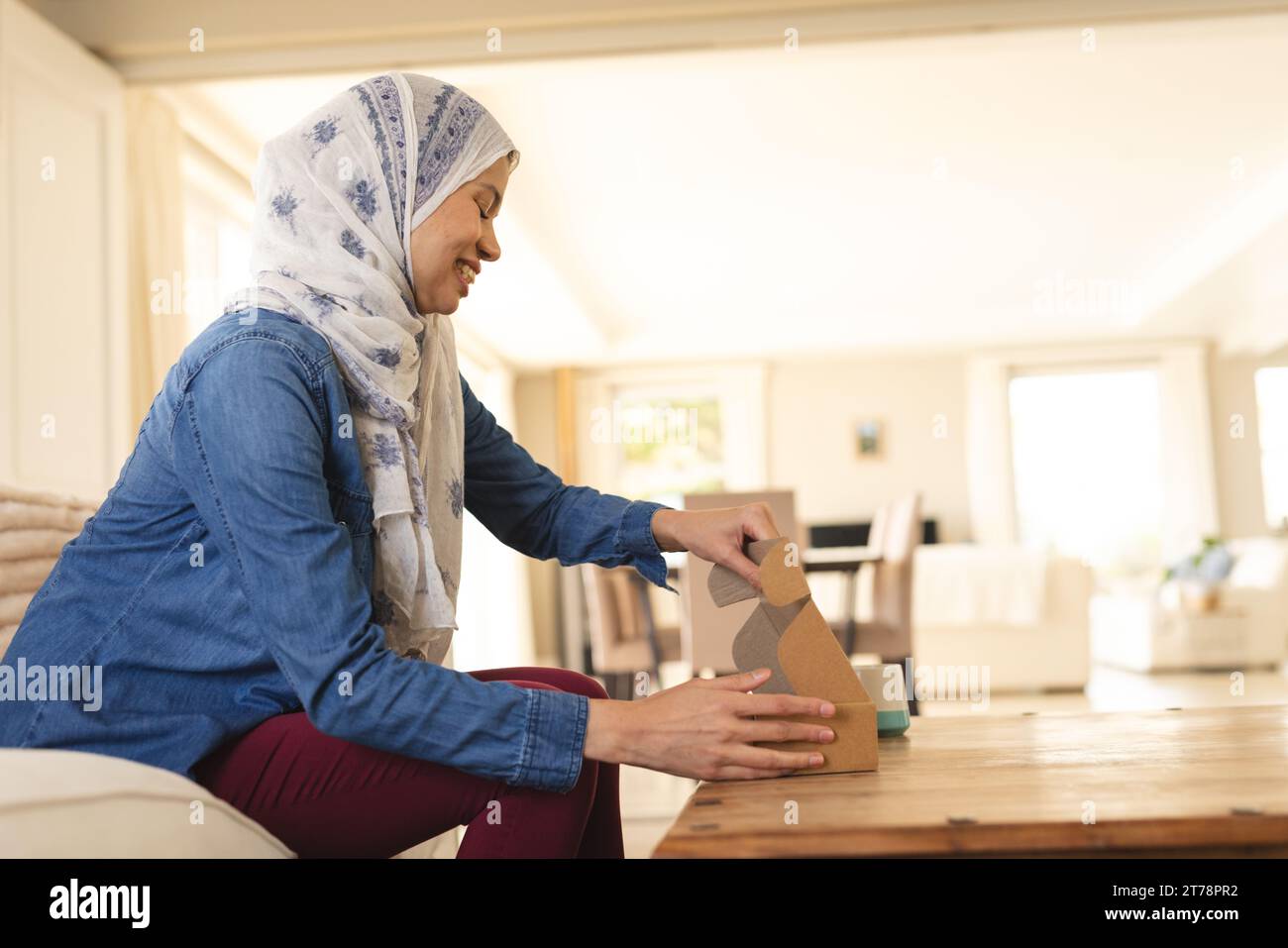 Unpacking the package hi-res stock photography and images - Alamy