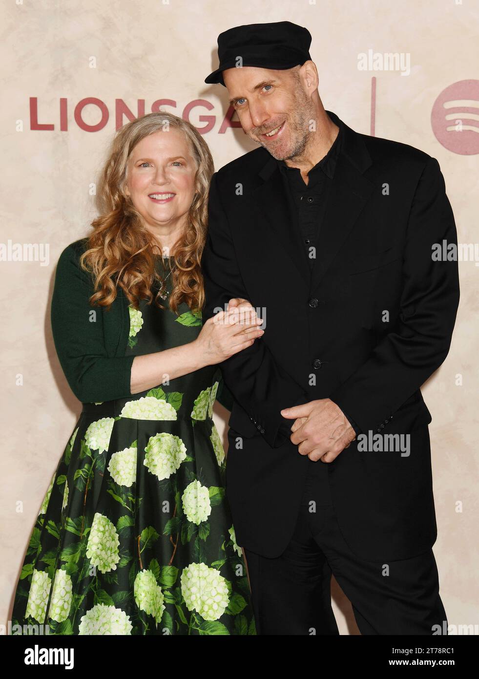 HOLLYWOOD, CALIFORNIA - NOVEMBER 13: (L-R) Suzanne Collins and Michael Arndt attend The Ballad ...