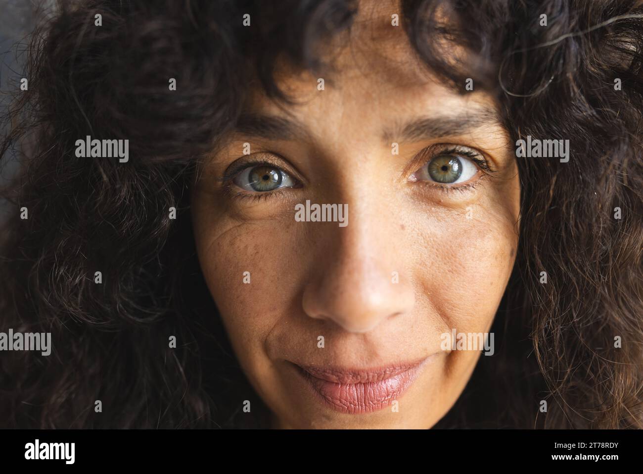 Portrait close up of happy caucasian mature woman with green eyes and ...