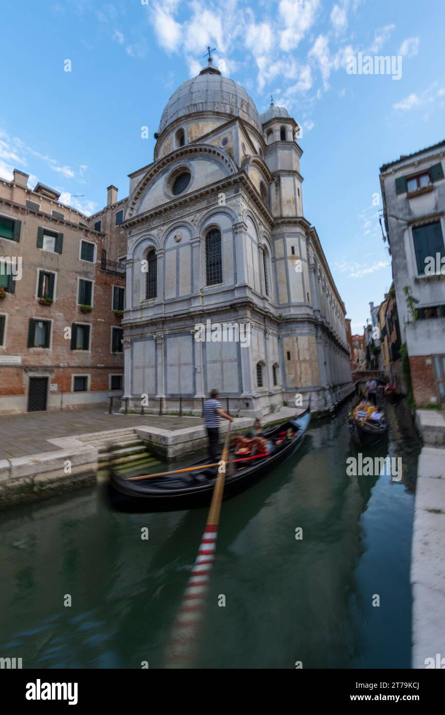 Riding the gondola through Venice, Italy Stock Photo - Alamy