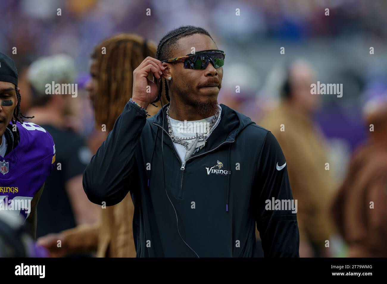 Minnesota Vikings wide receiver Justin Jefferson watches action from ...