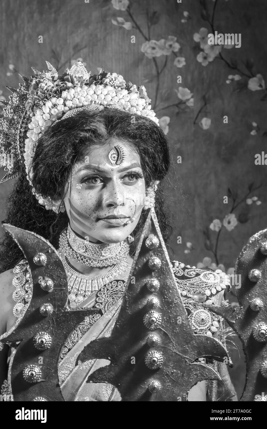 Portrait of beautiful Indian girl of Durga Idol Agomoni Concept Indoor ...