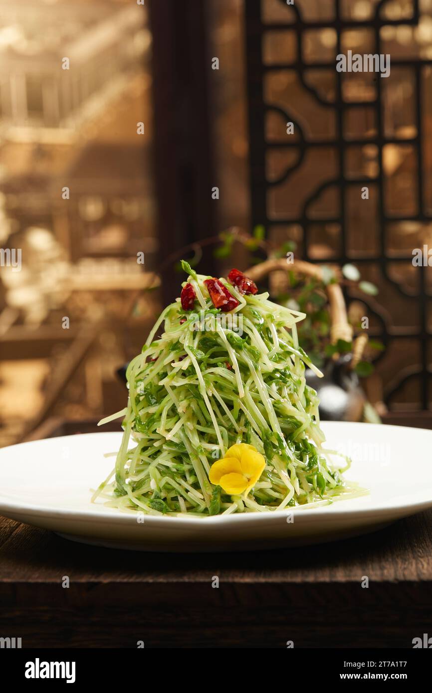 stir fried (Sautéed) Pea Sprouts salad Stock Photo - Alamy