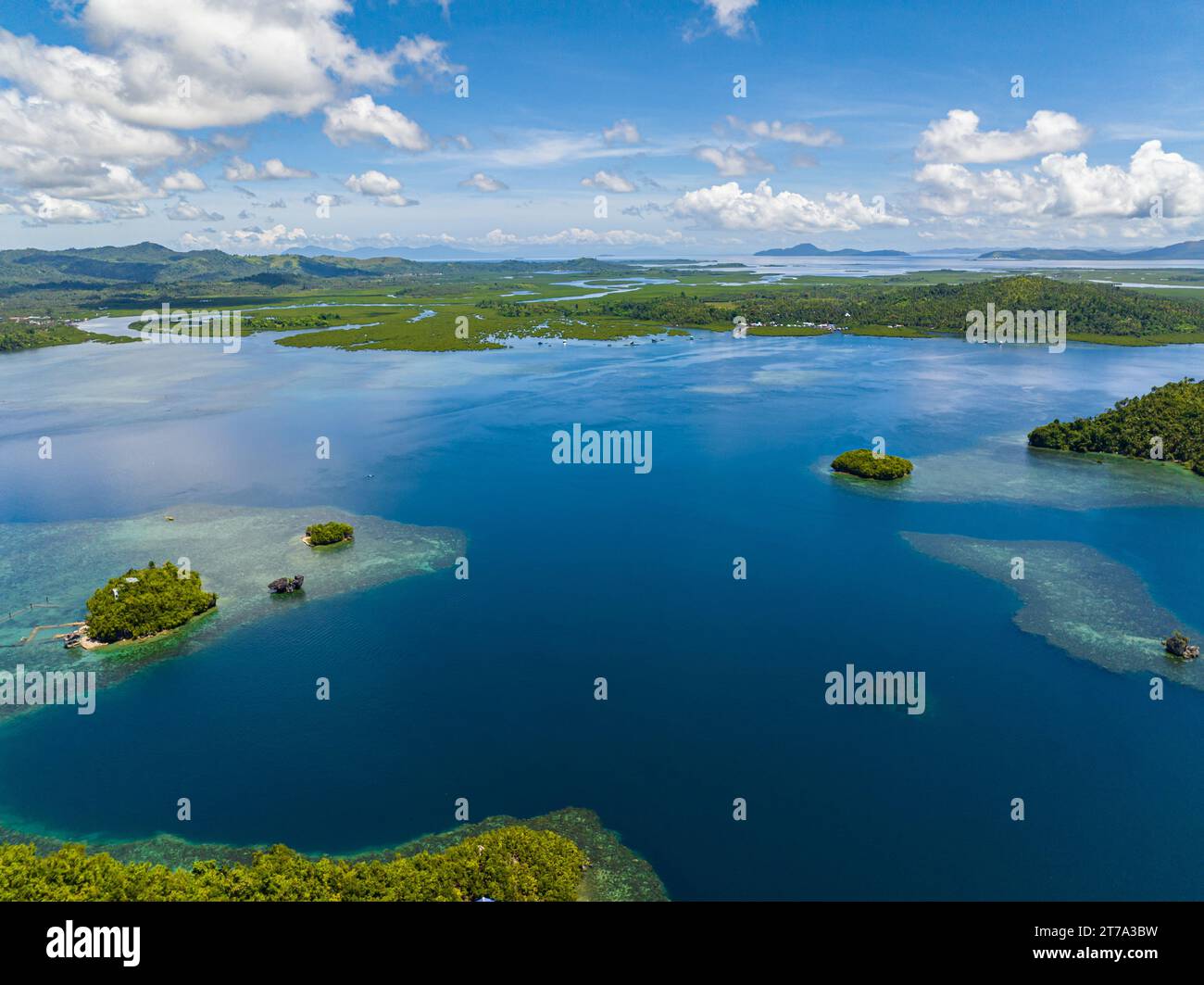 Beautiful lagoons with beach coast and coral reefs. Tropical islands ...