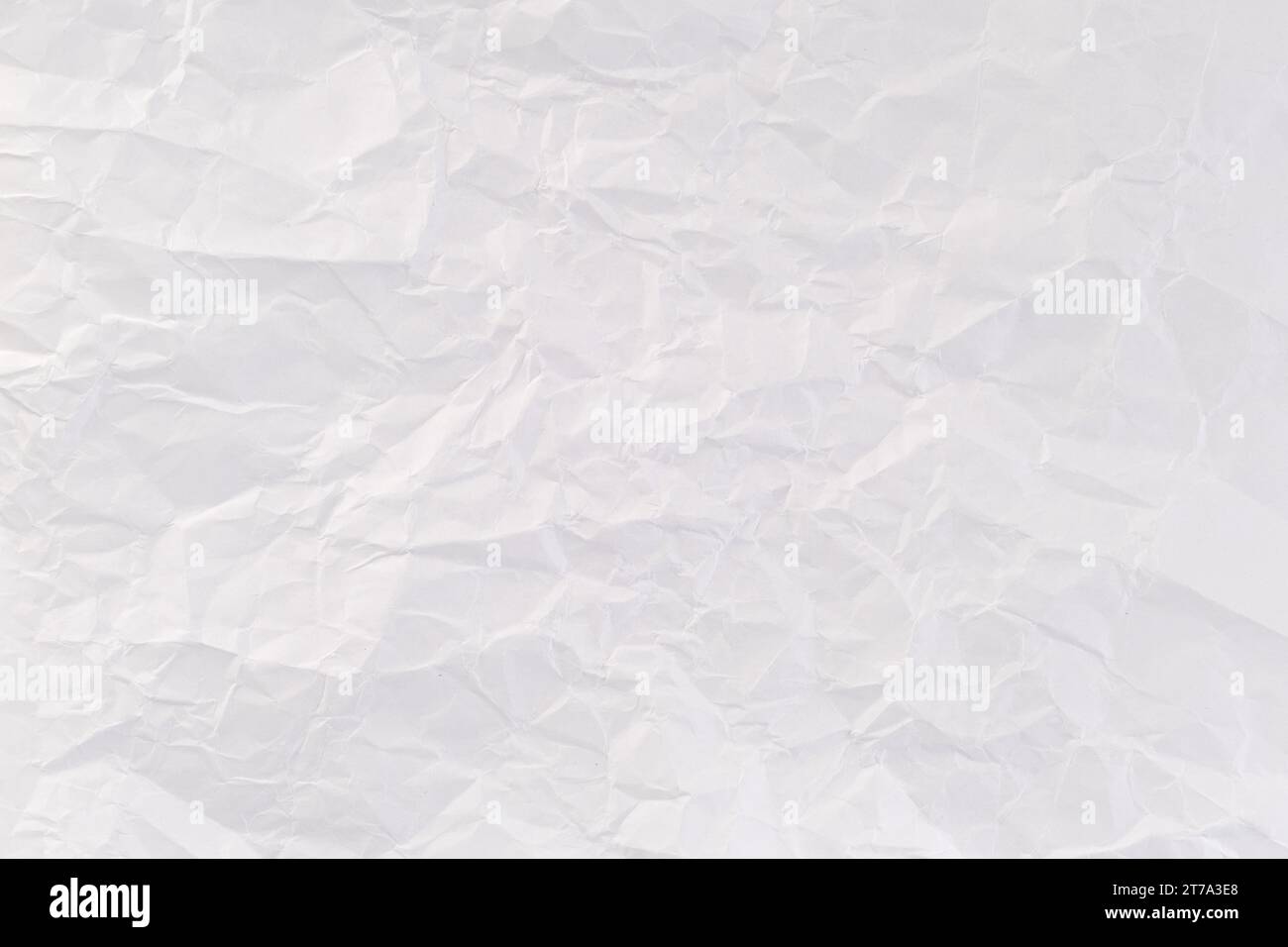 Background from an empty crumpled sheet of white office paper. Full ...