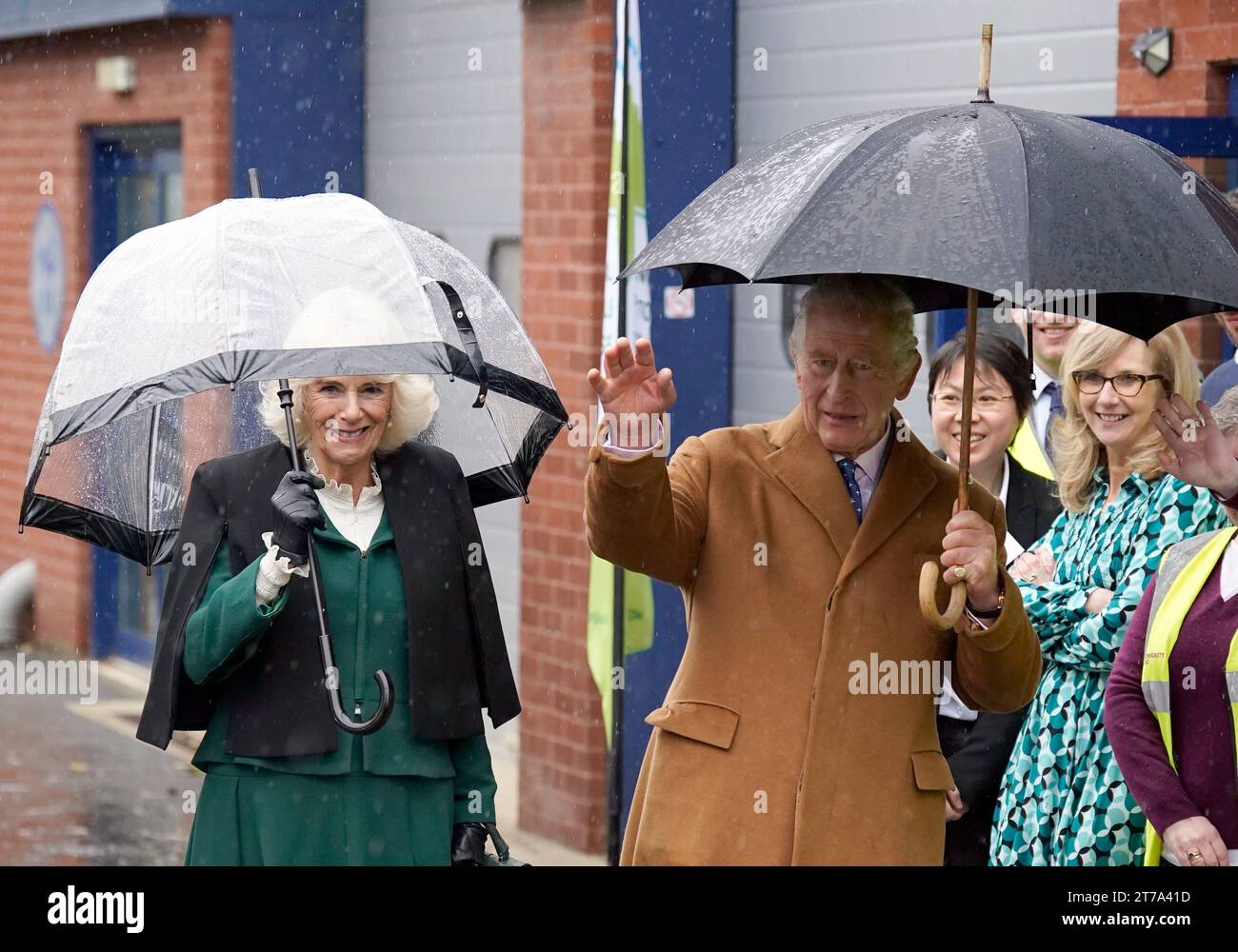 King Charles III and Queen Camilla wave off van drivers as they leave ...