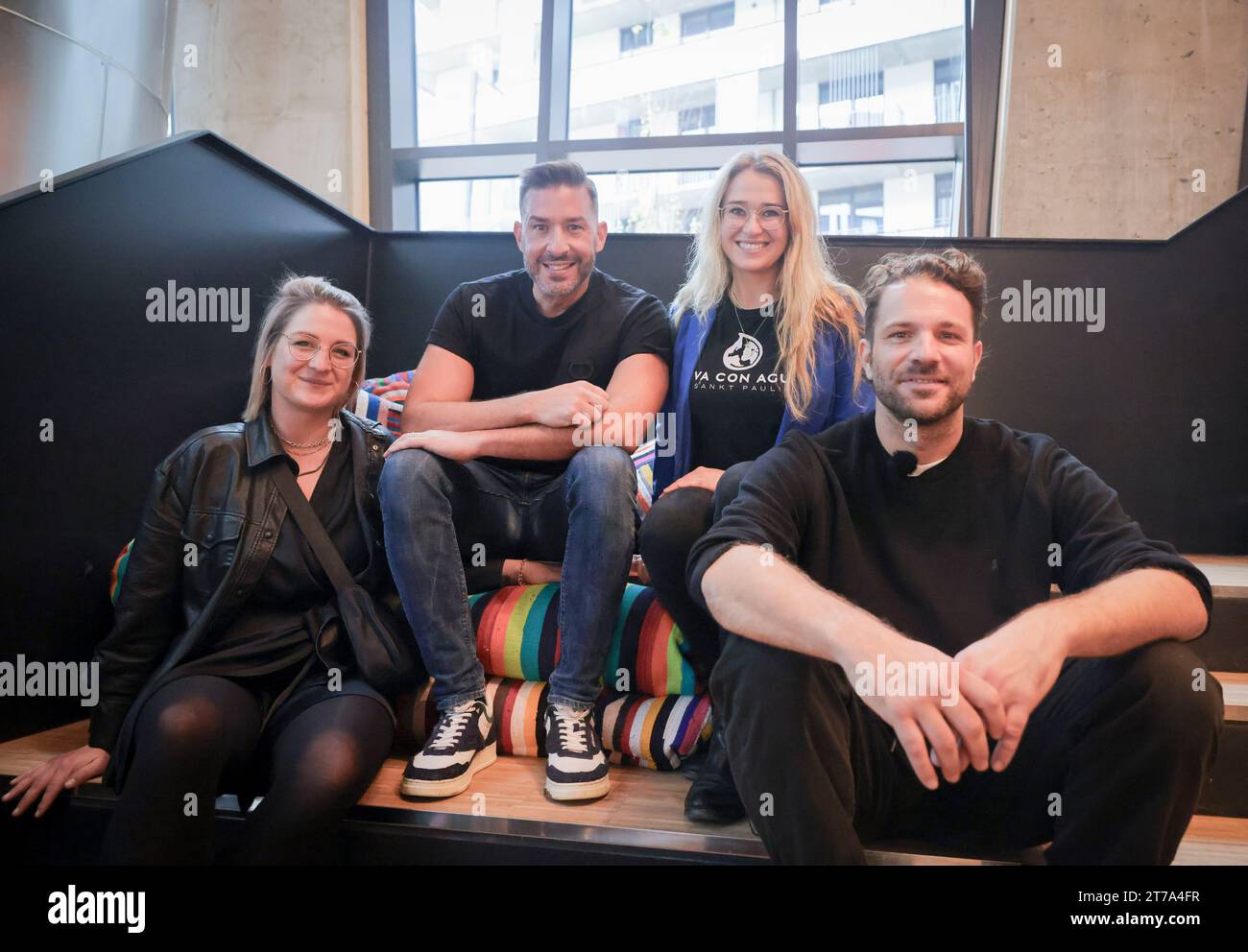 14 November 2023, Hamburg: Viva con Agua initiator Benjamin Adrion (r-l ...