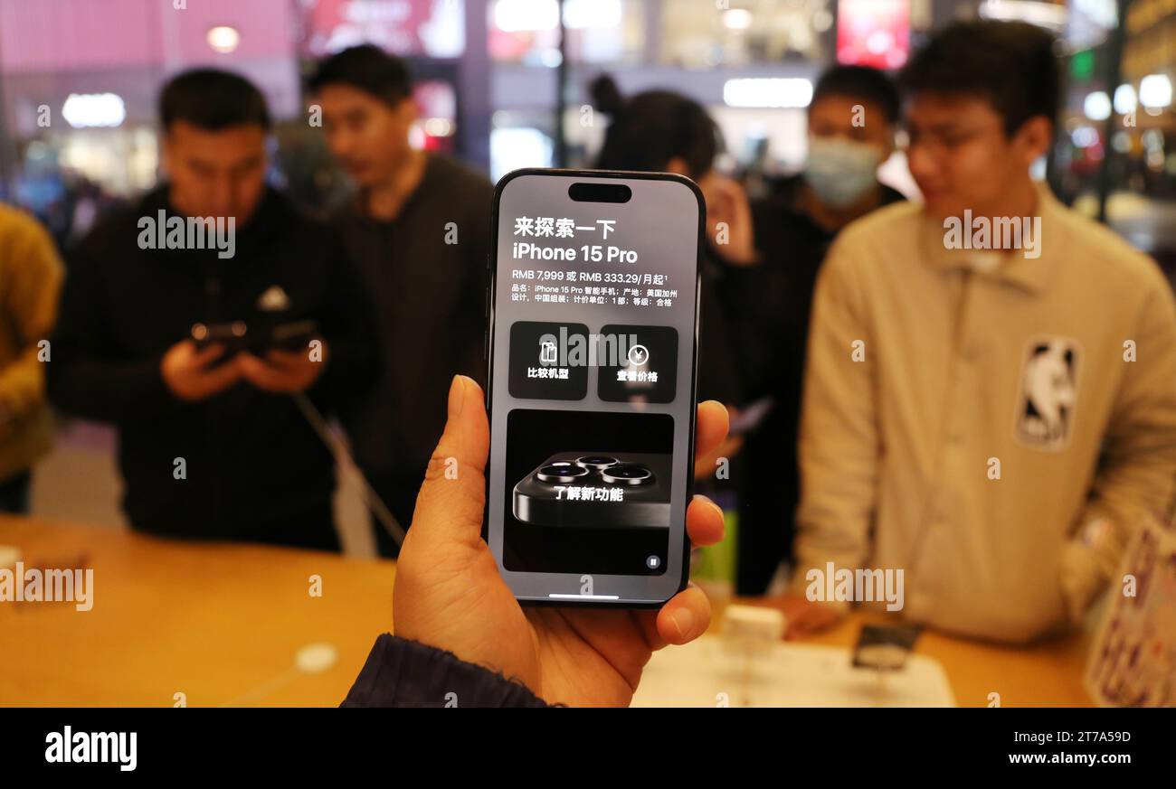 SHANGHAI, CHINA - NOVEMBER 12, 2023 - Customers experience iPhone15 at ...