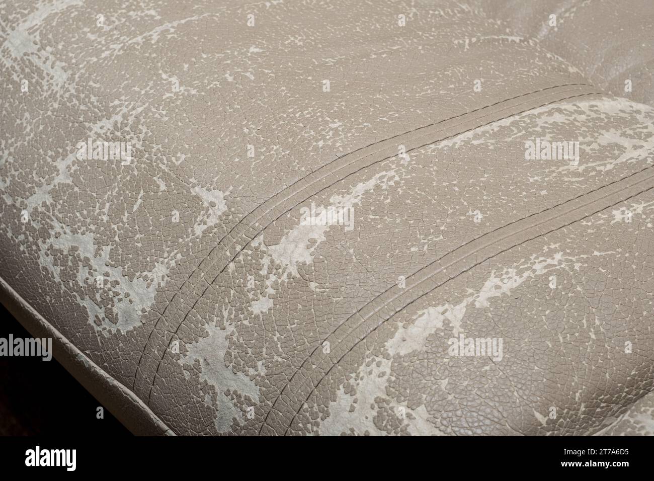 Defects on a white leather sofa. Damaged to leather furniture Stock ...