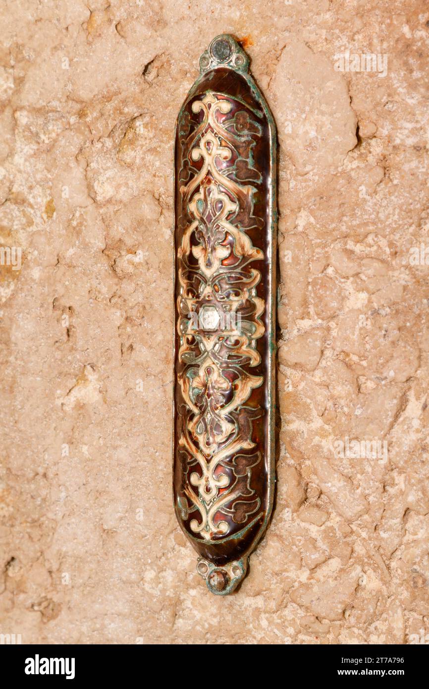 Mezuzah affixed to the doorposts of the Red Pawnshop (Banco Rosso) to ...