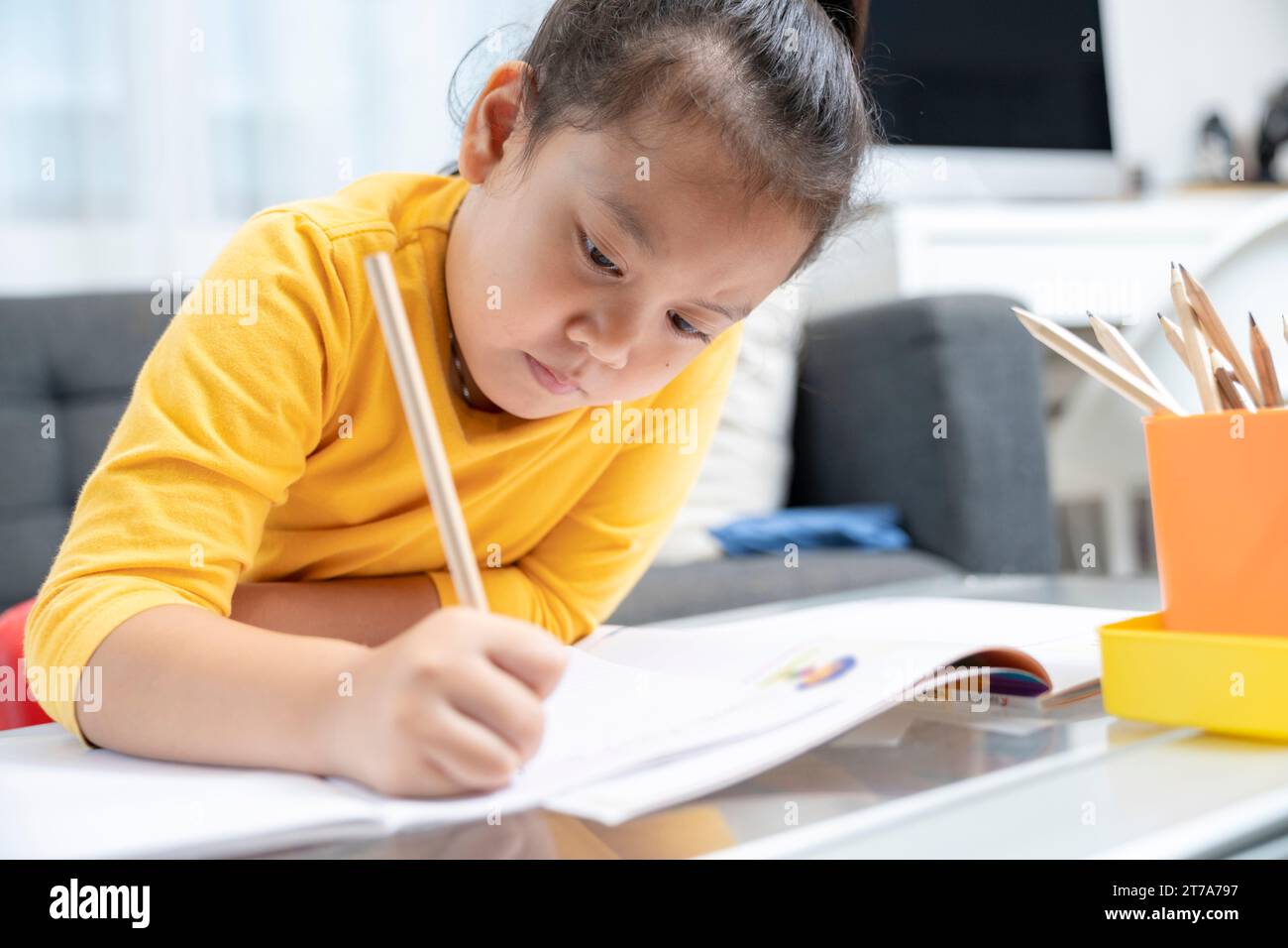 Kid doing homework hi-res stock photography and images - Alamy