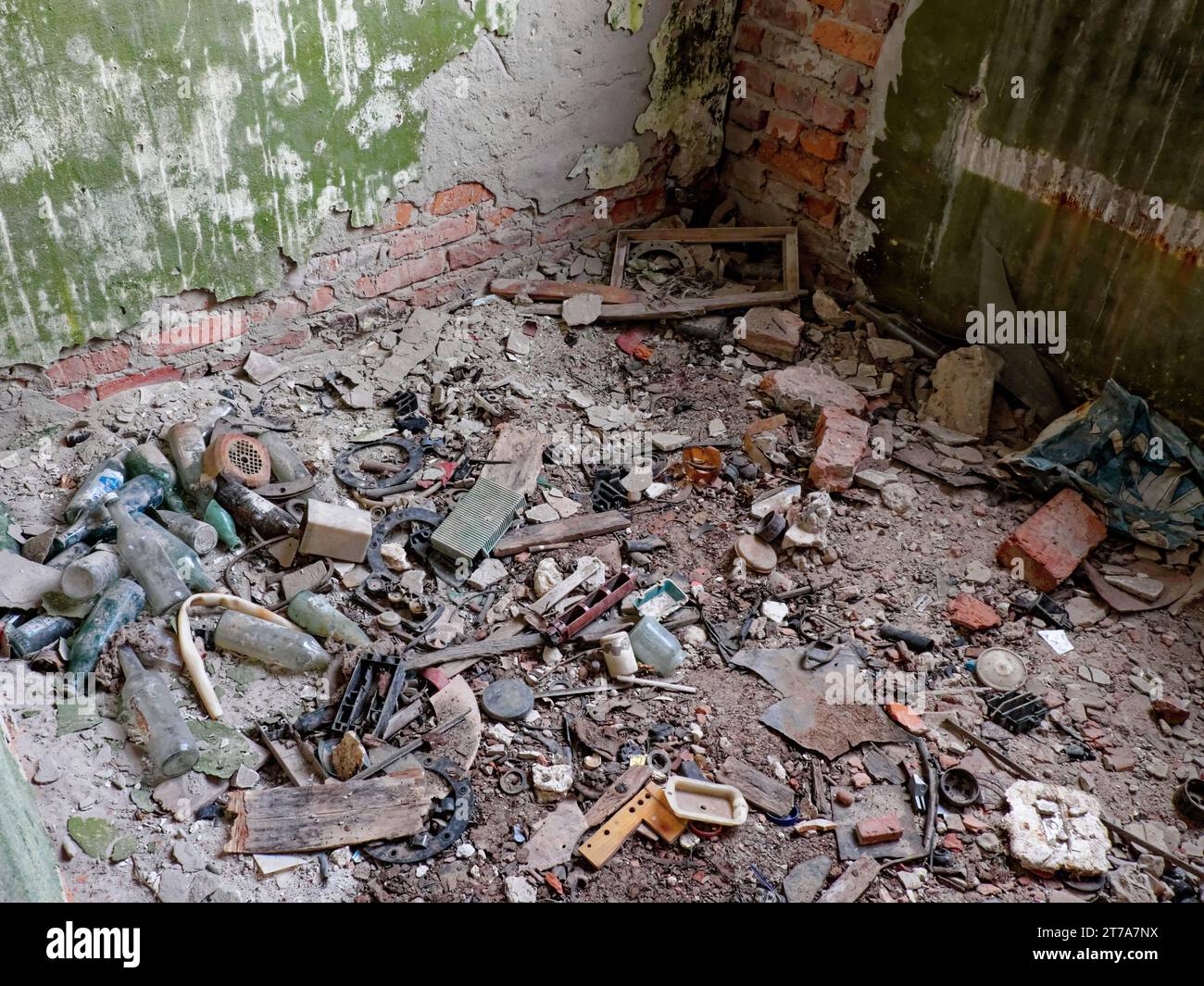 A pile of debris in an abandoned building Stock Photo - Alamy