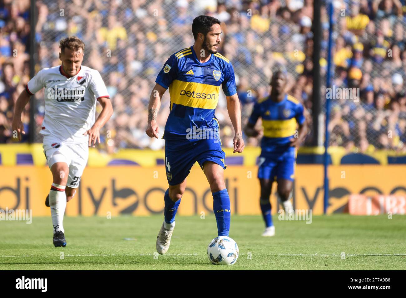 Nicolas Figal of Boca Juniors and Angelo Martino of Newells during the ...