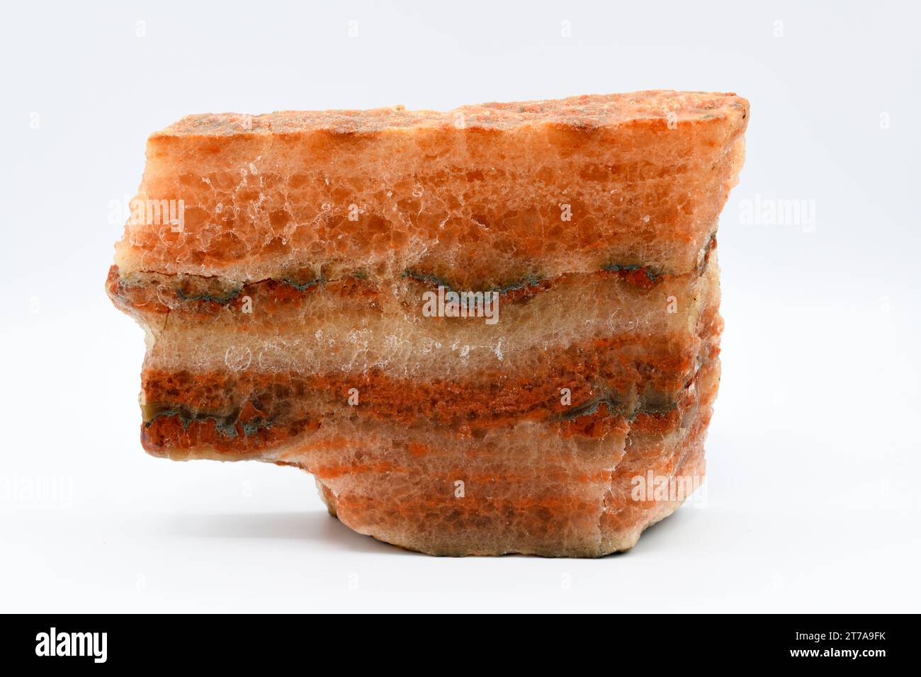 Halite (white), sylvine (orange) and clay (grey). Halite is a sodium ...