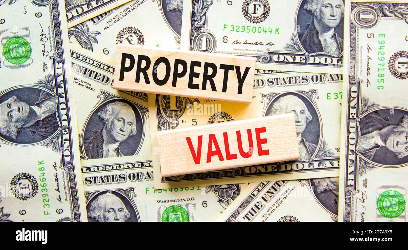 Property value symbol. Concept words Property value on beautiful wooden ...