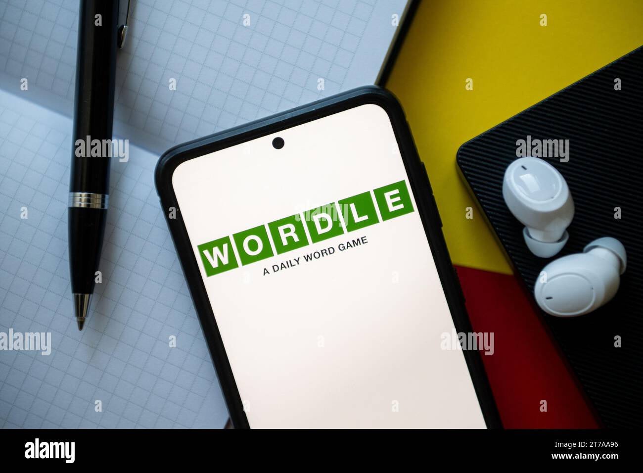 In this photo illustration a Wordle logo seen displayed on a smartphone ...