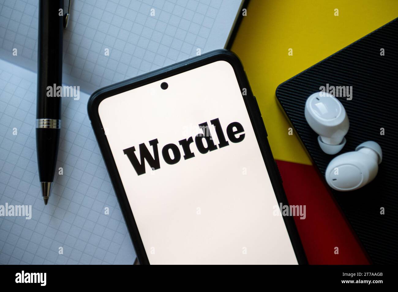 In this photo illustration a Wordle logo seen displayed on a smartphone ...