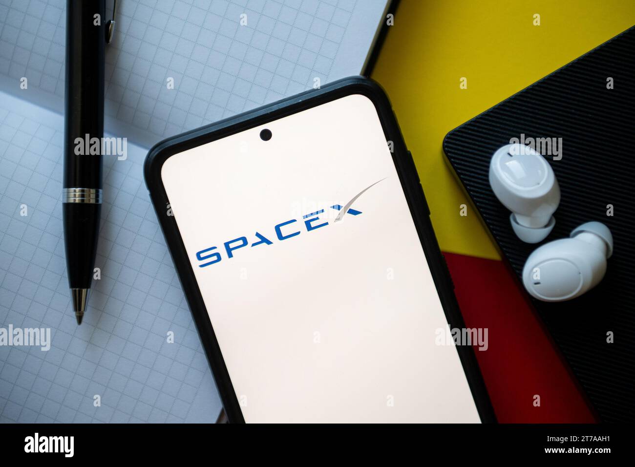 In this photo illustration a Spacex logo seen displayed on a smartphone ...