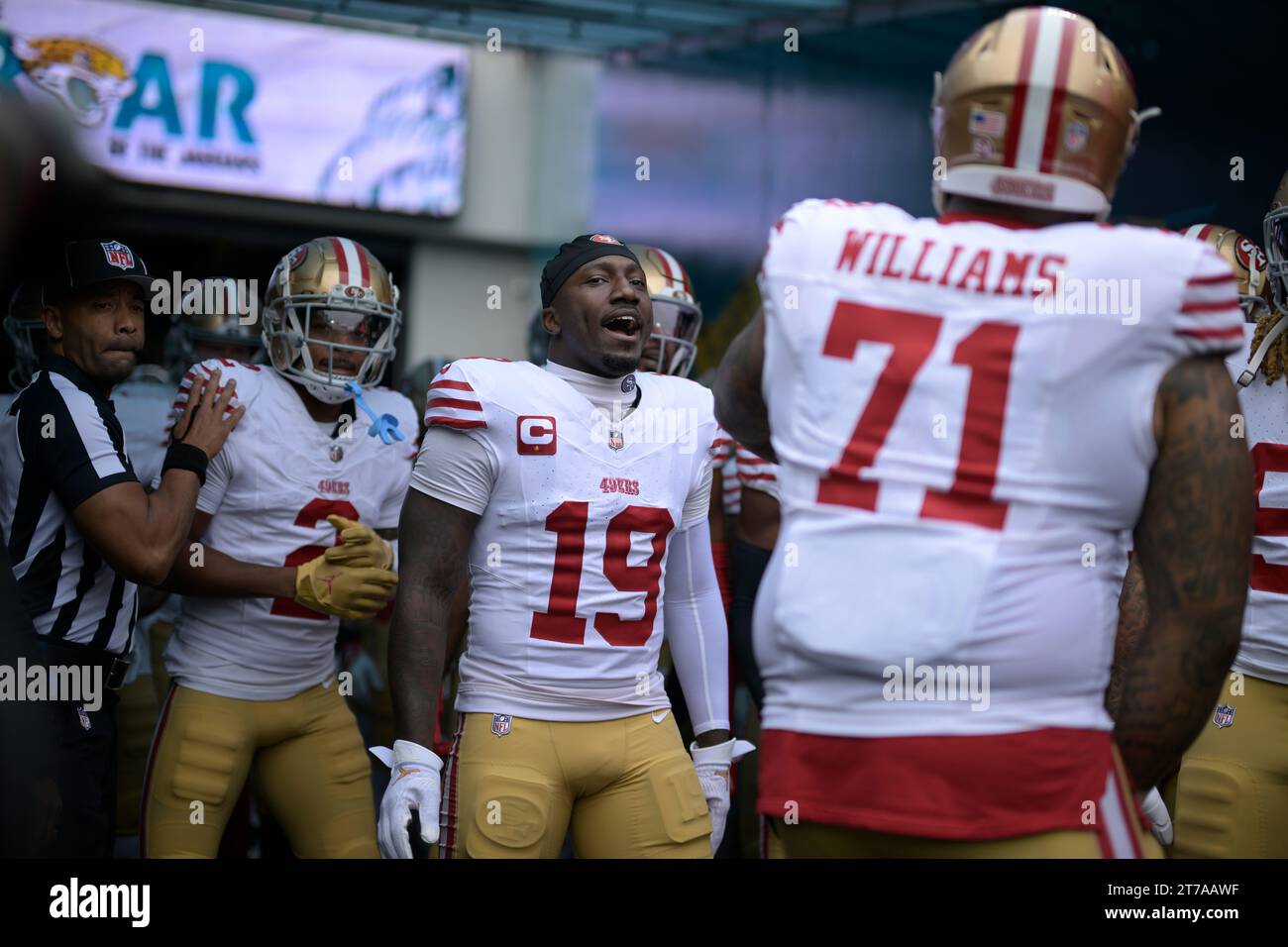 San Francisco 49ers wide receiver Deebo Samuel (19) and teammates ...