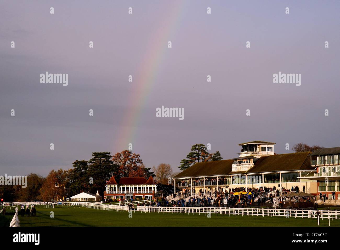 A rainbow appears over the course as runners and riders compete in the ...