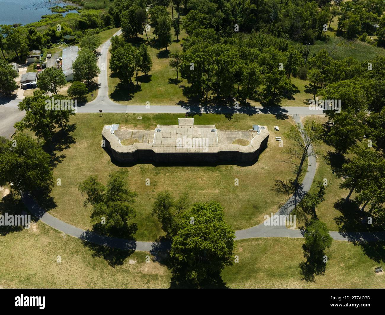 Aerial view of a small fort surrounded by lush green grass and a body ...