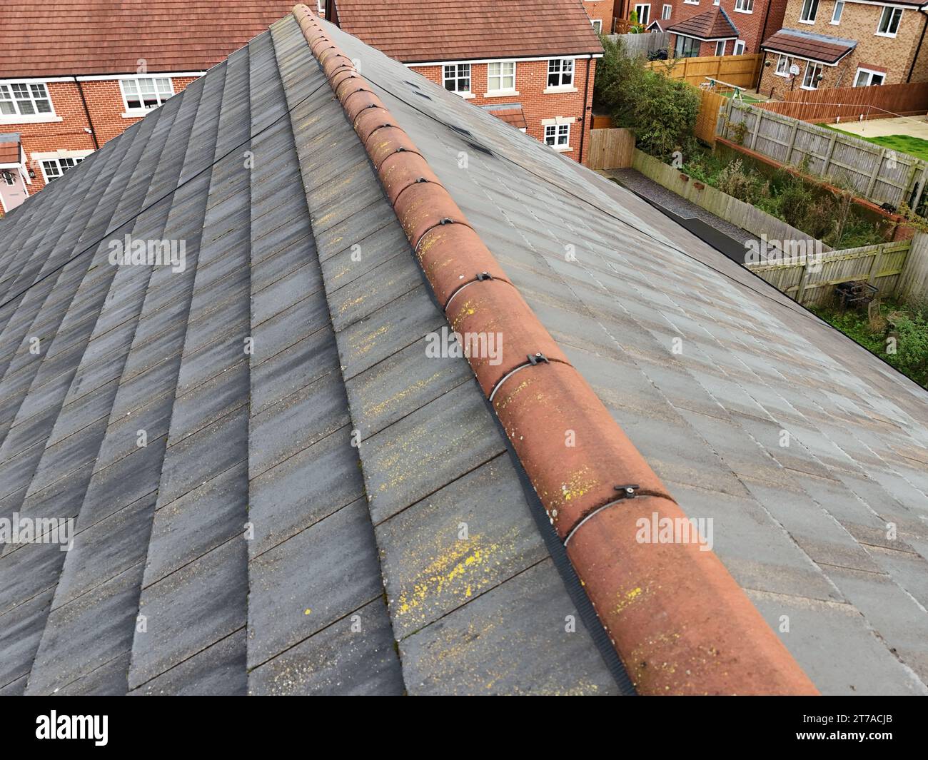A weathered grey tiled roof surface Stock Photo - Alamy