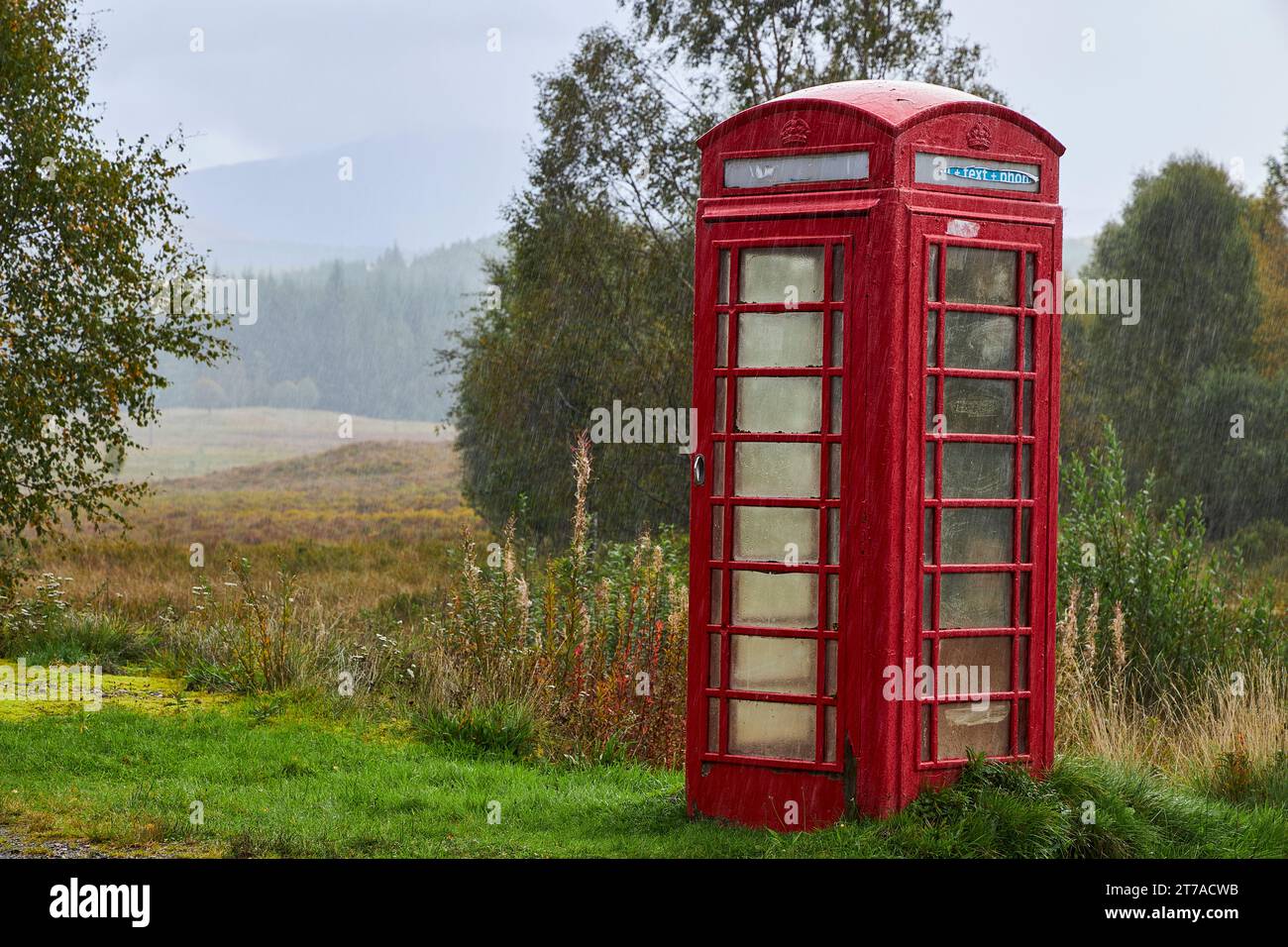 Traditional red Telephone box designed by Sir Giles Gilbert Scott in ...