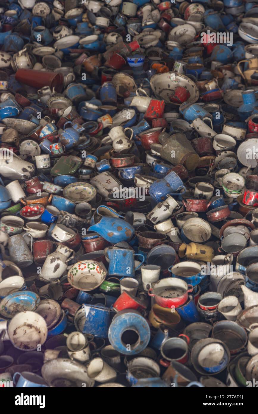 Oswiecim, Poland - July 17, 2023: Impressive tile of old pots and pans ...