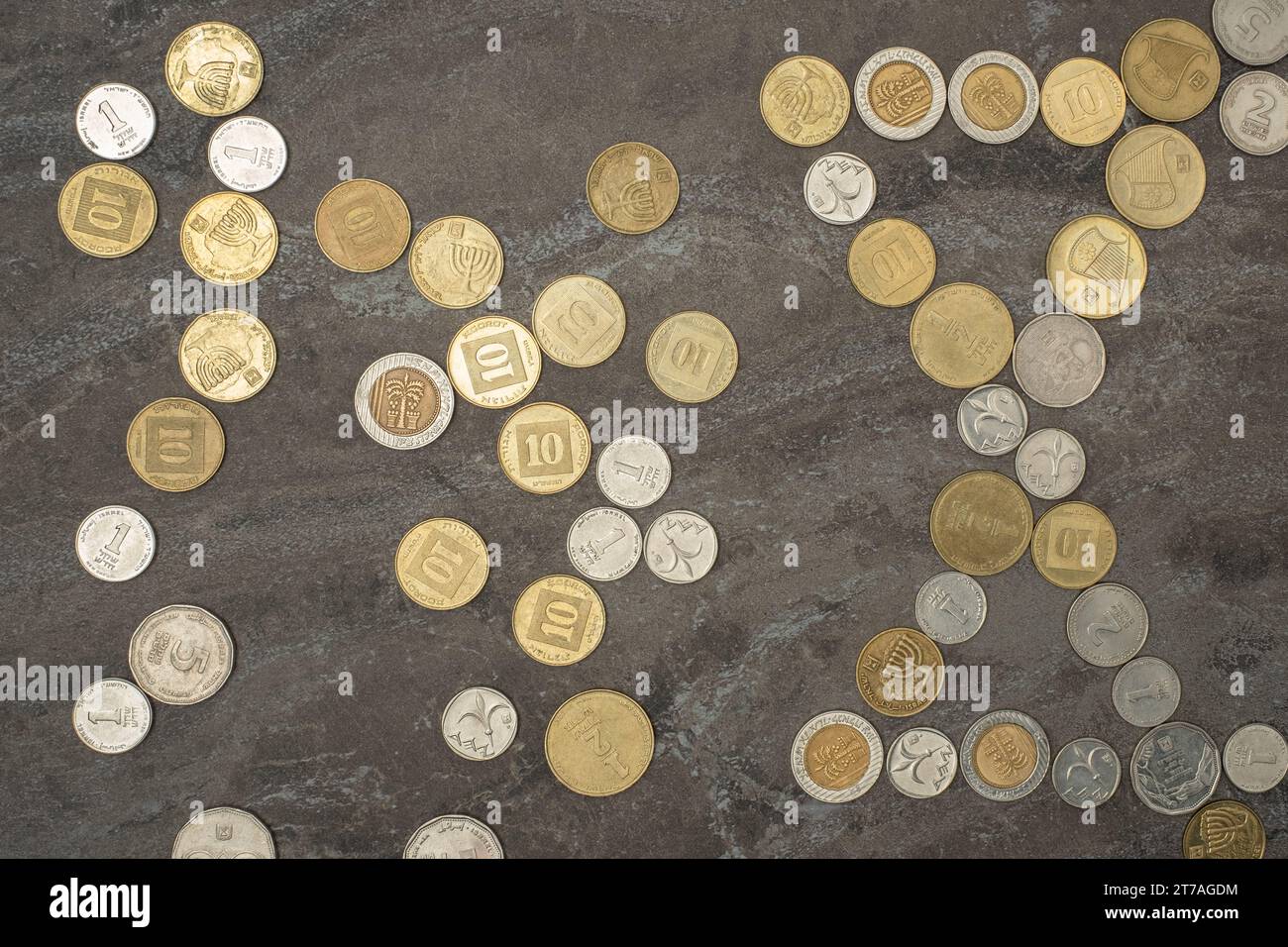 Israel's new shekel (NIS) coins in heap. Israel currency Money cash ...