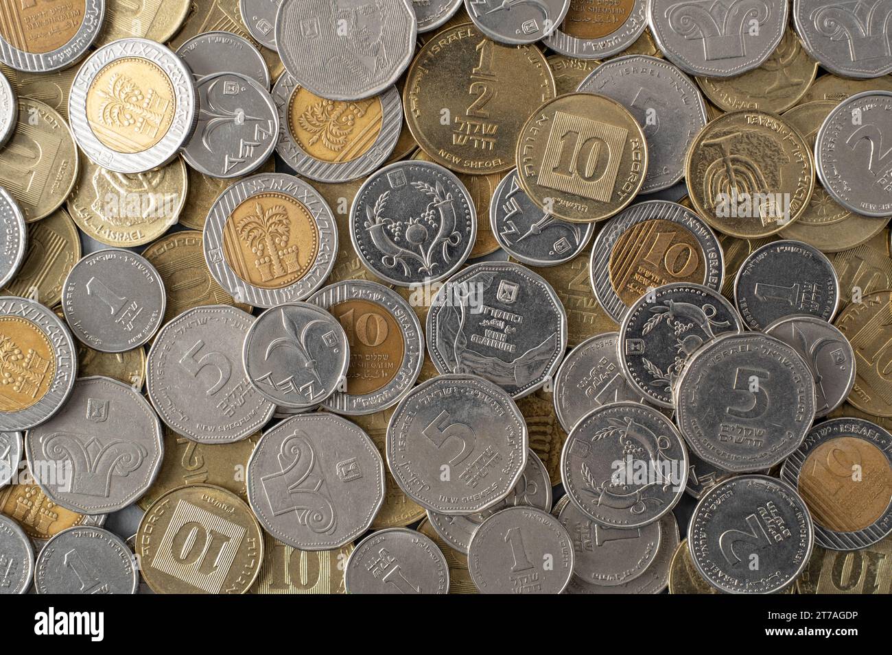 Israel's new shekel (NIS) coins in heap. Israel currency Money cash ...