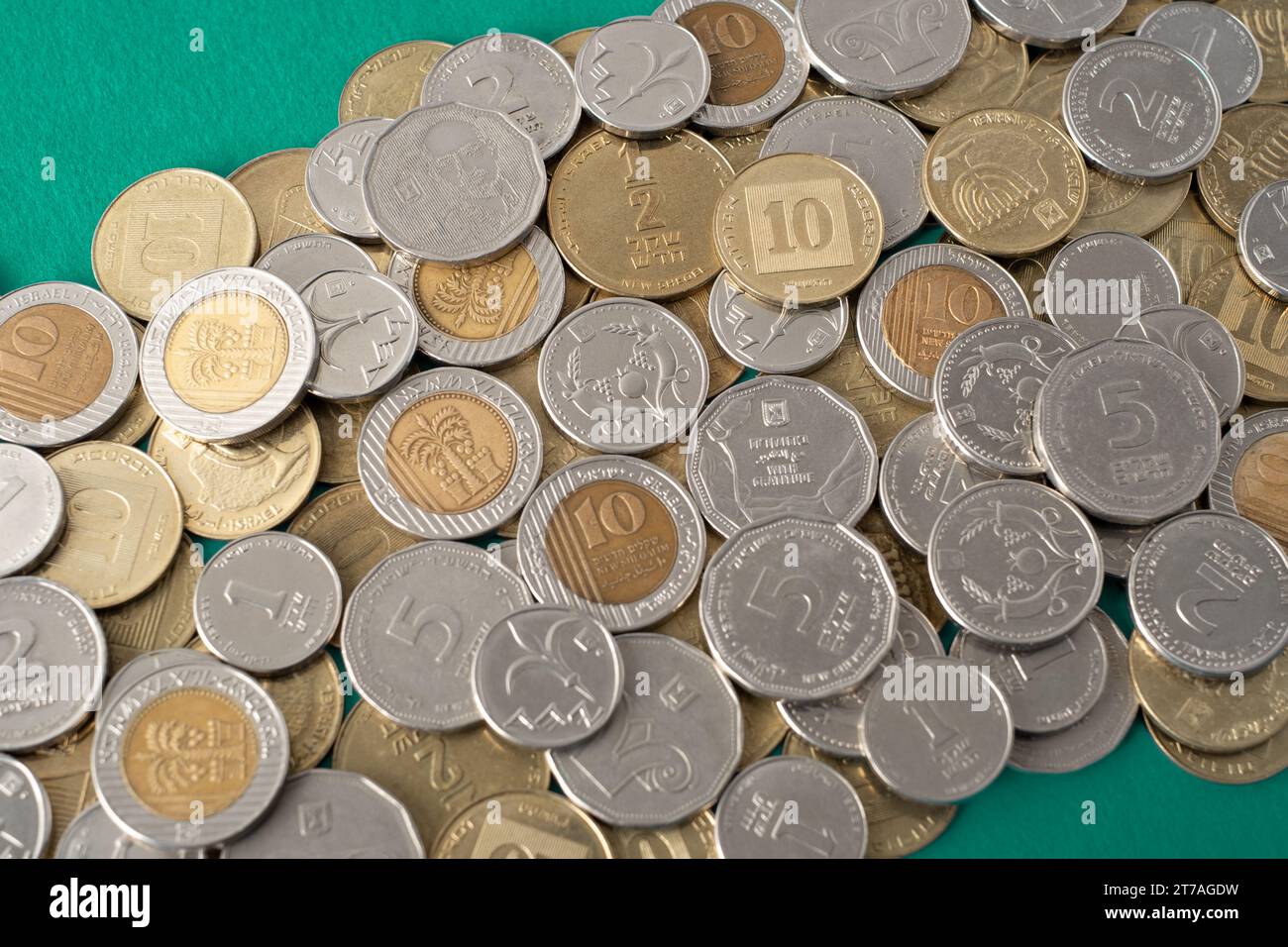 Israel's new shekel (NIS) coins in heap. Israel currency Money cash ...