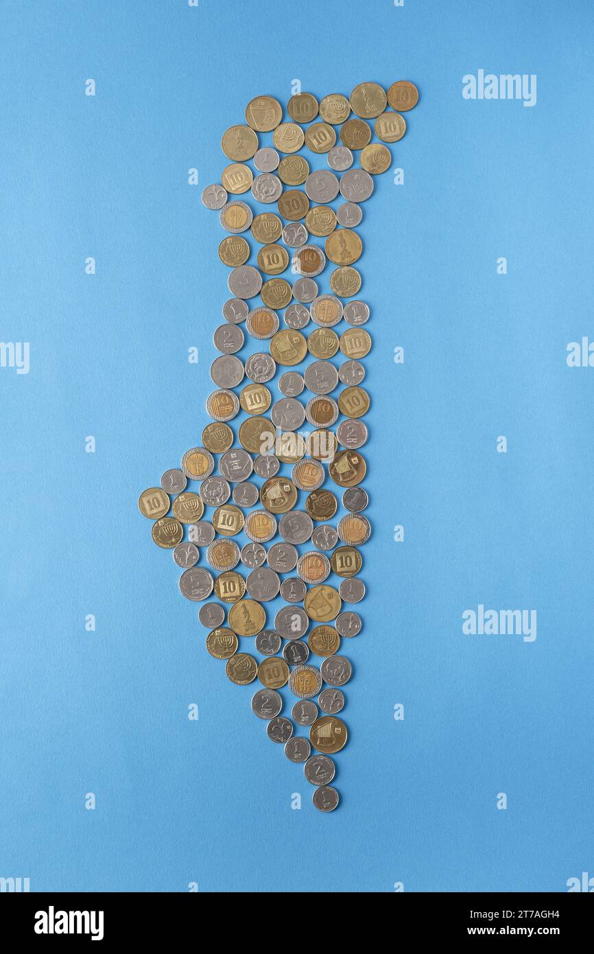 Israel's new shekel coins arranged to form the shape of the map of ...