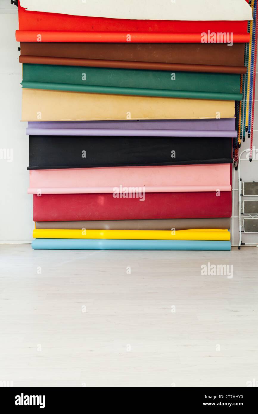 paper backgrounds photo studio colored paper hanging on the wall Stock ...