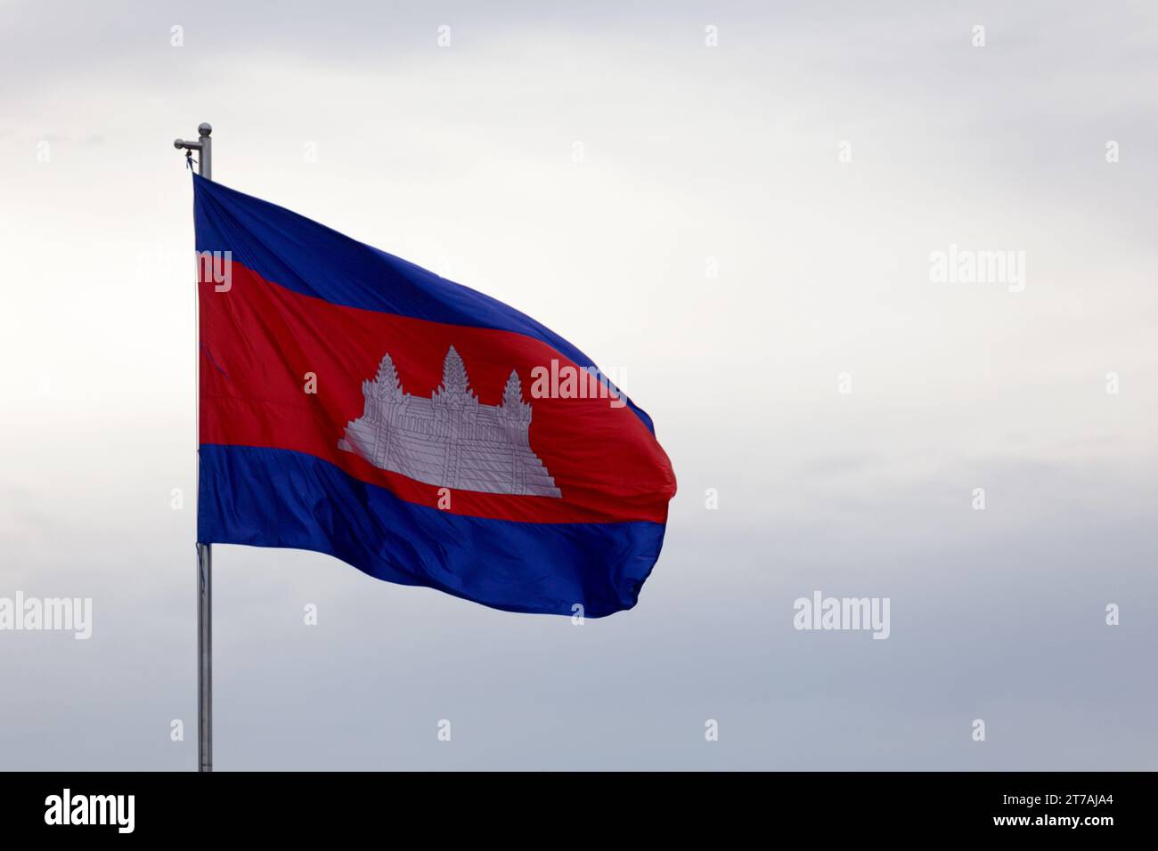 Cambodian flag waving atop of its pole Stock Photo - Alamy