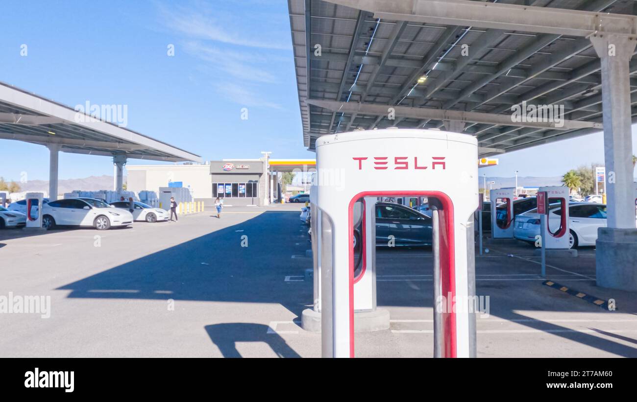 Daytime Tesla Charging, Supercharging Station Power-Up Stock Photo - Alamy
