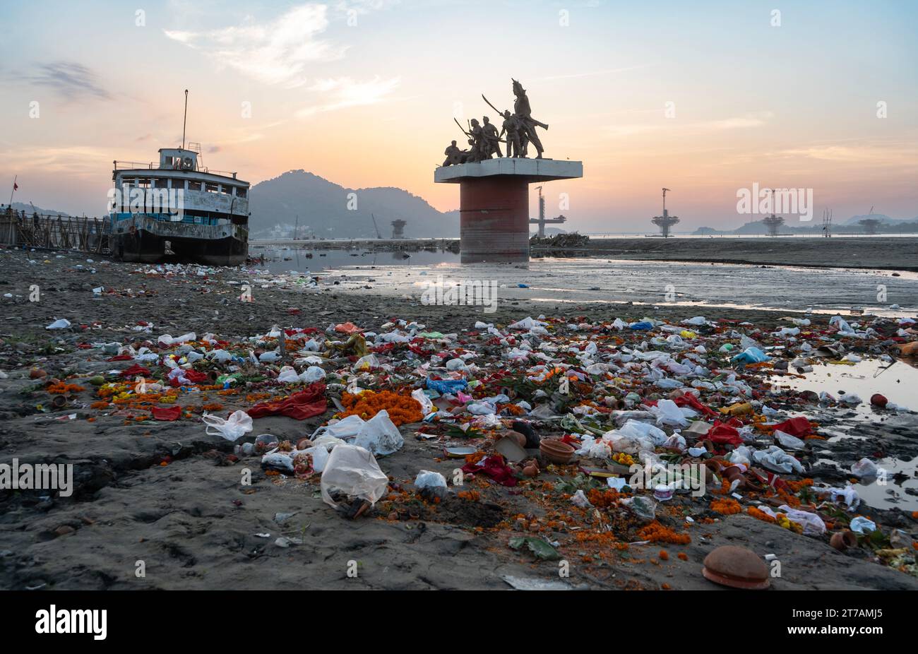 November 14, 2023: Plastic bags and puja ingredients and others litter ...