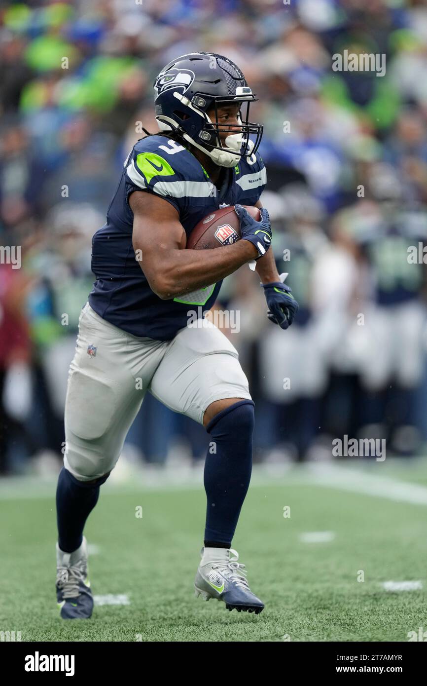 Seattle Seahawks running back Kenneth Walker III (9) runs with the ball ...