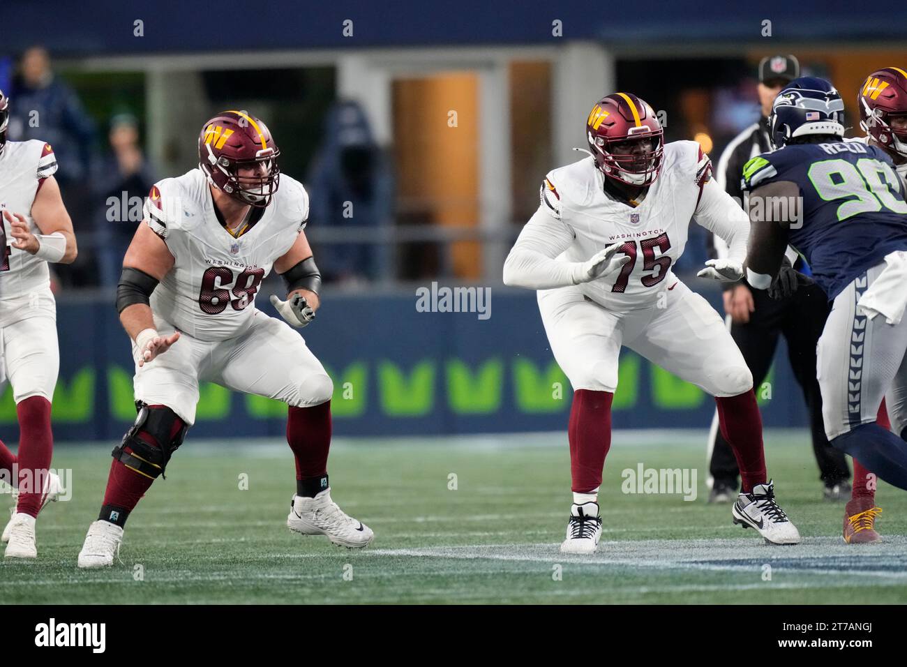 Washington Commanders center Tyler Larsen (69) and guard Chris Paul (75 ...