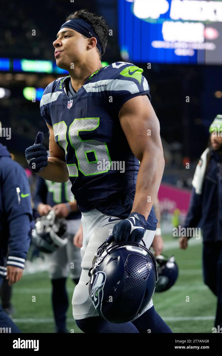 Seattle Seahawks running back Zach Charbonnet (26) walks off the field ...