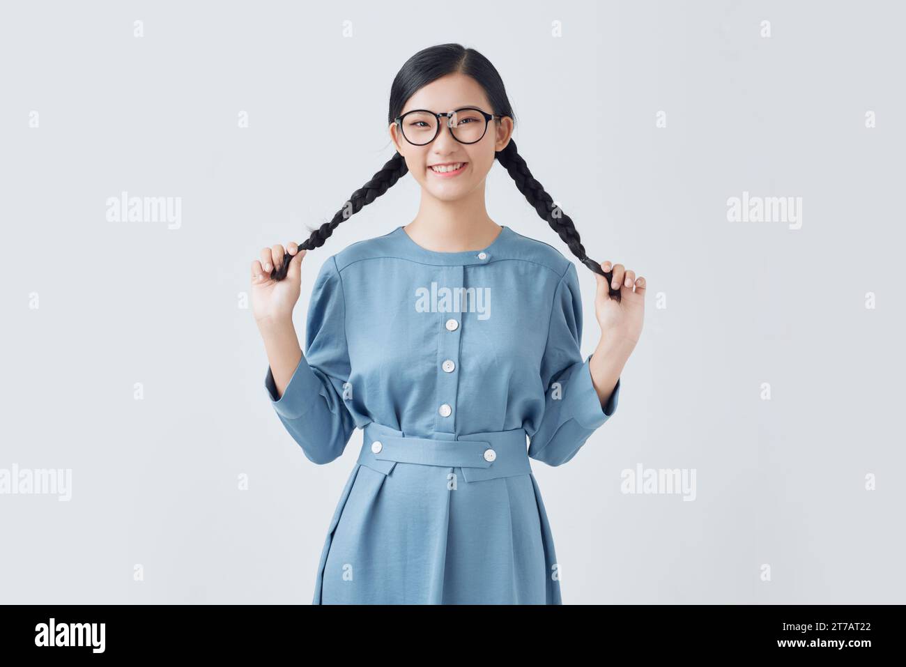 young beautiful woman with pigtail braids hairstyle Stock Photo - Alamy